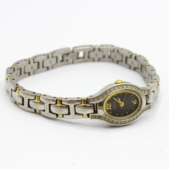Seiko | Accessories | Vintage Seiko Womens Watch Stainless Silver Gold Steel Water Resist Quartz ...